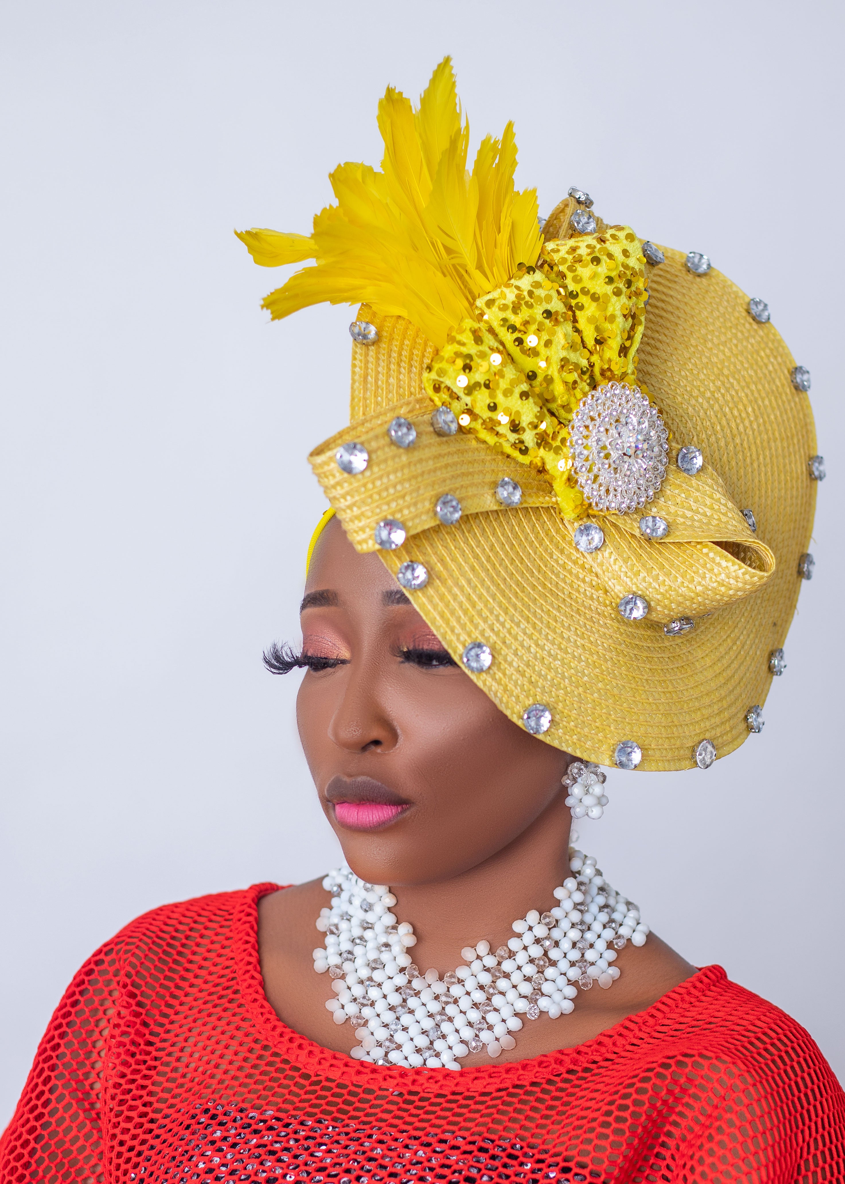 African/Nigerian Turban Yellow sequence, feathers and woven material ...