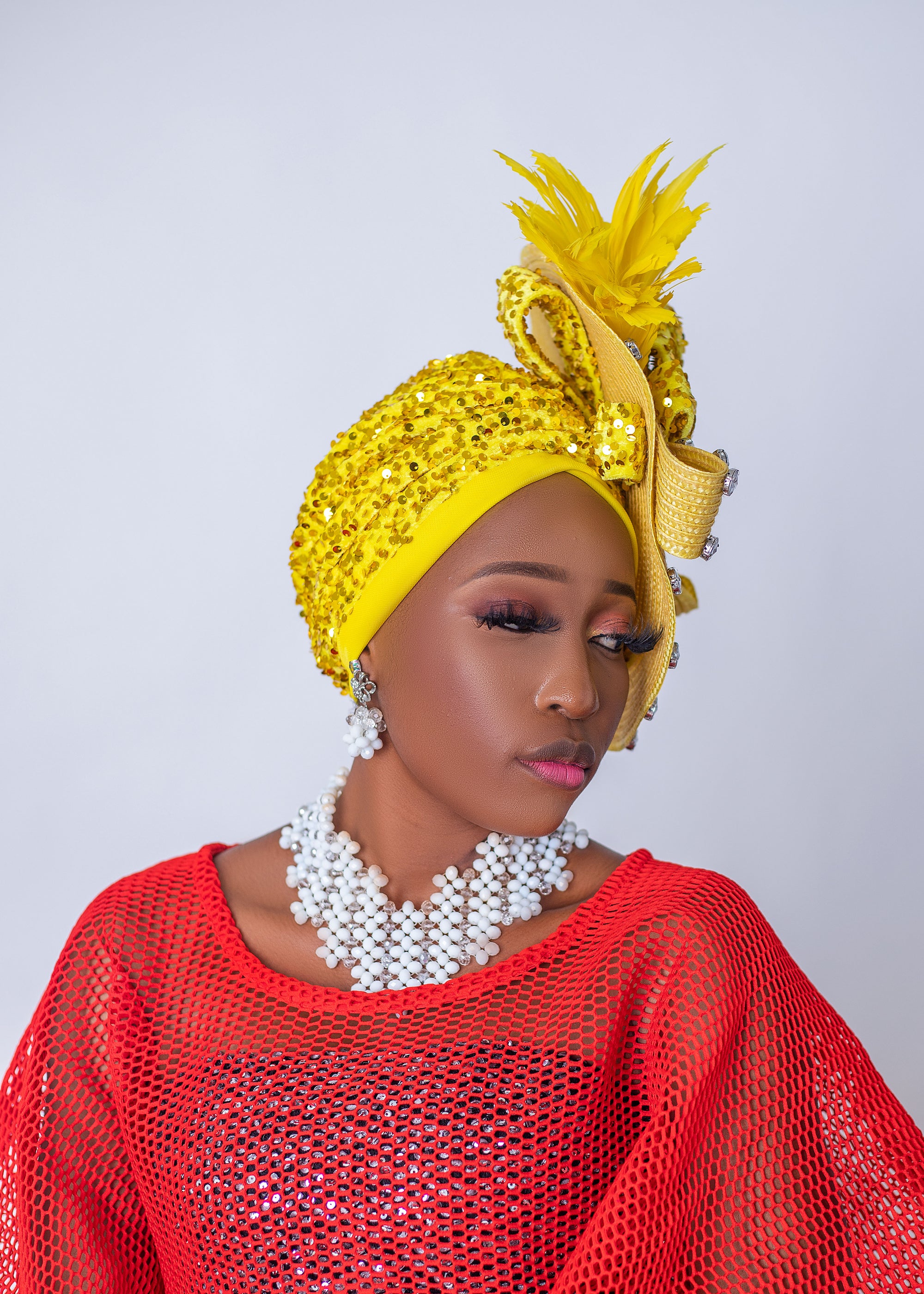 African/Nigerian Turban Yellow sequence, feathers and woven material ...