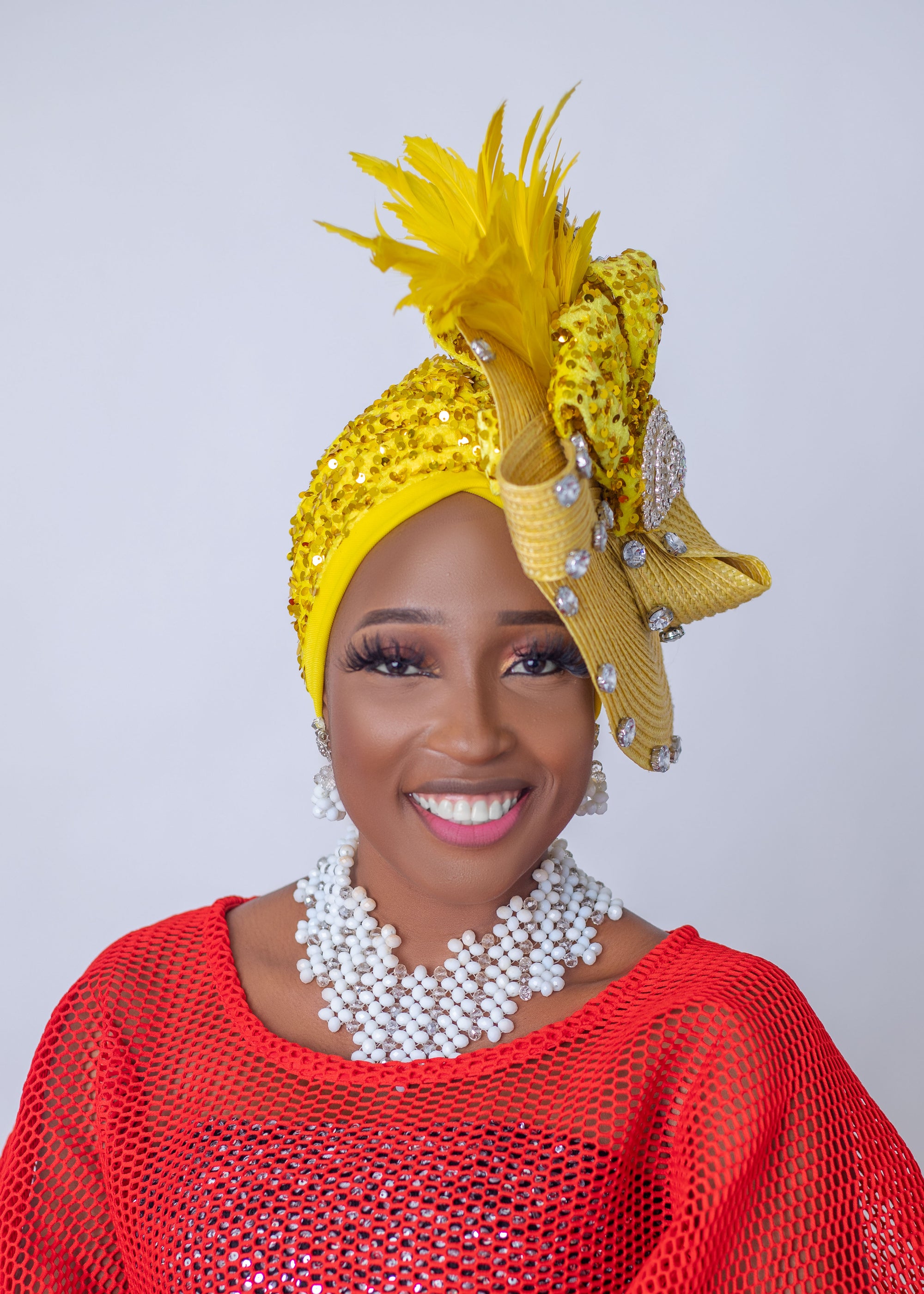 African/Nigerian Turban Yellow sequence, feathers and woven material ...